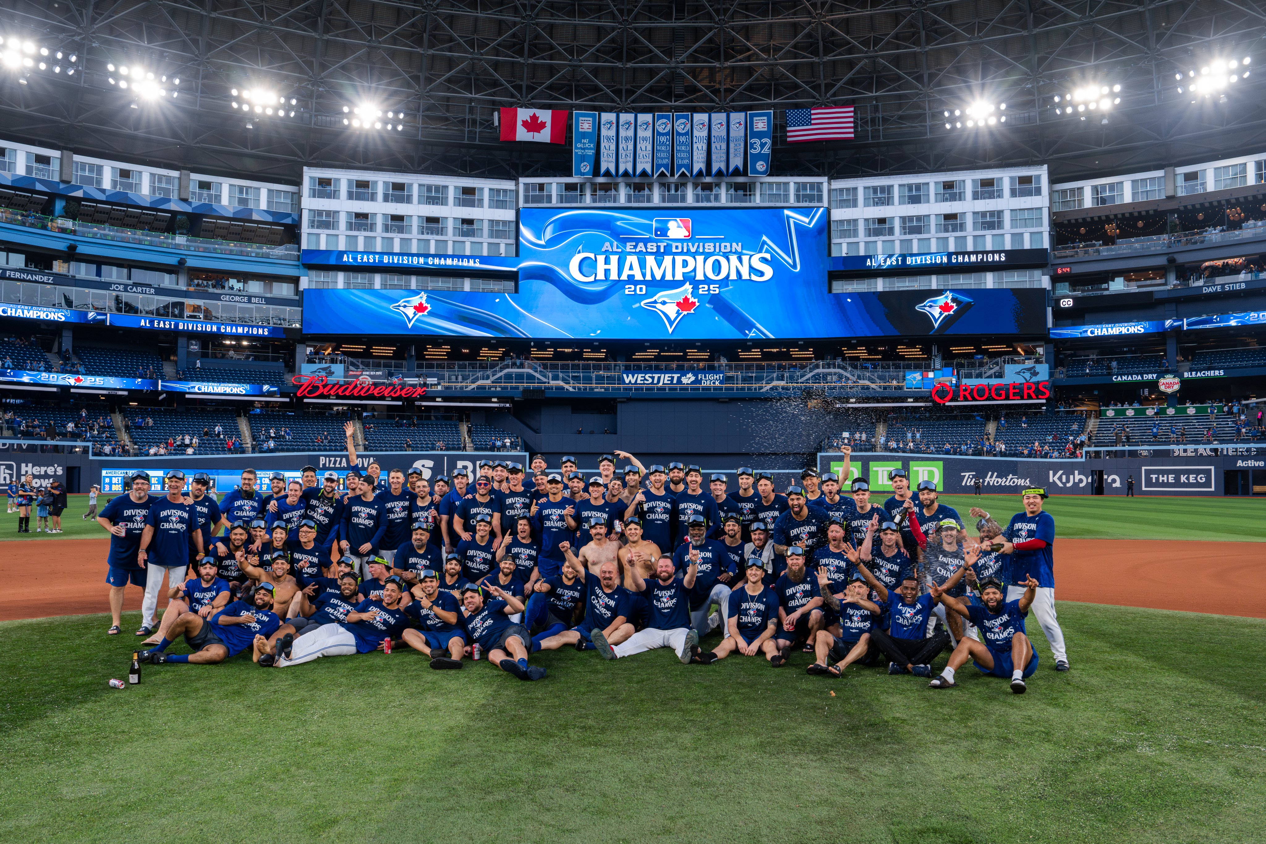 Blue Jays beat Rays 13-4 to win East title and earn bye to division series