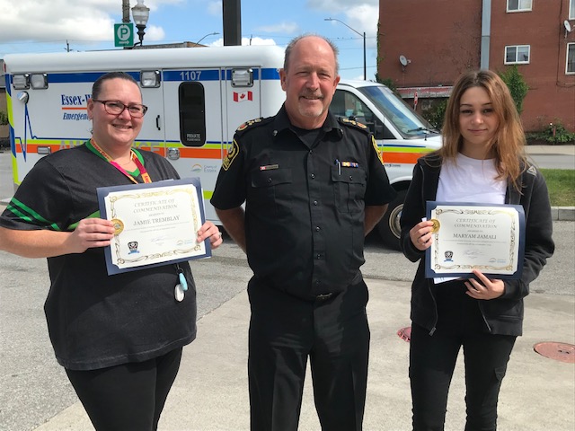 Two convenience store workers recognized for life saving actions after matchete attack